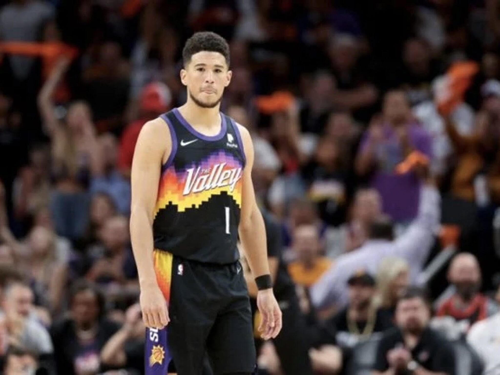 Phoenix Suns’ Shooting Guard Devin Booker Fist Bumps Baby After Buzzer ...